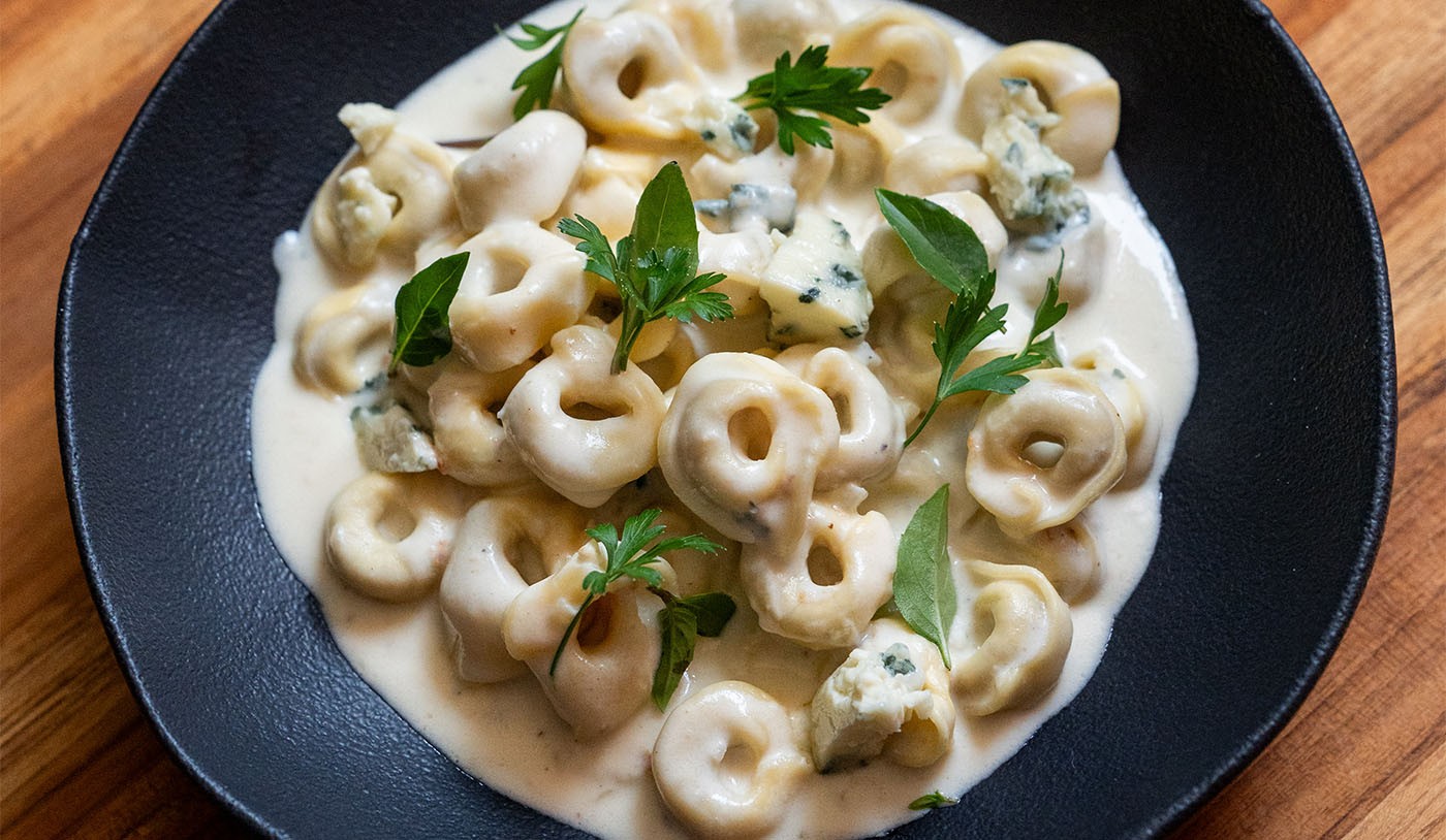 Receita de Tortellini de Funghi Porcini com molho quatro queijos